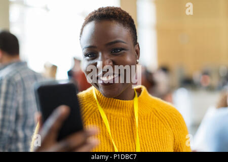 Smiling businesswoman using smart phone in car Stock Photo - Alamy