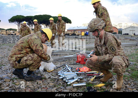 A Soldier from British Army’s 22nd Royal Engineers Regiment gives ...