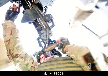 A DShK heavy machine gun mounted on camouflaged open-backed civilian ...