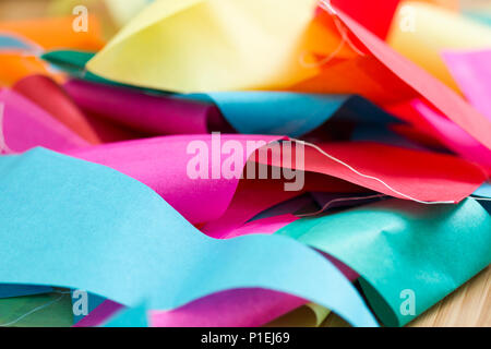 Tangled, crumpled bunting (party decorations). Colorful, blurry ...