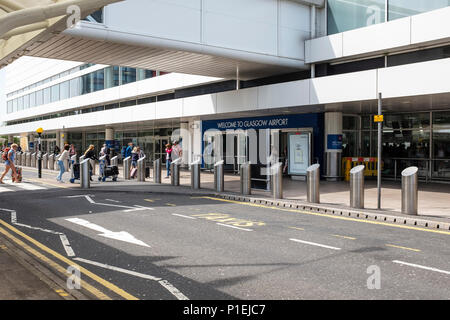 Terminal building of Glasgow Airport, Scotland, UK with taxi rank and ...