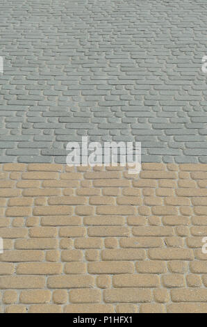 A detailed photo of the square, laid out of modern paving stone with ...