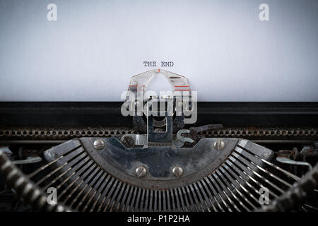The end text typed on an old vintage typewriter Stock Photo - Alamy