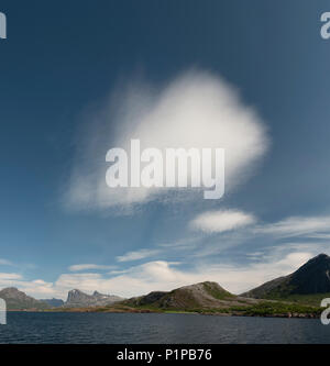 fluffy clouds from strong wind on a dark blue sky Stock Photo - Alamy
