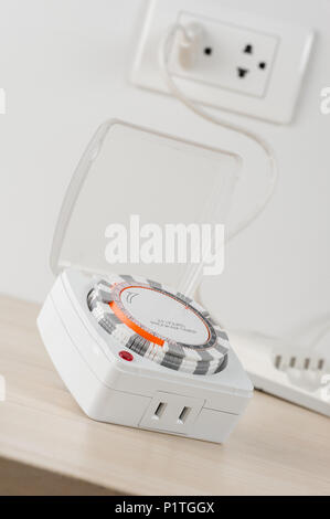 electrical socket with 24 hours program timer Stock Photo - Alamy