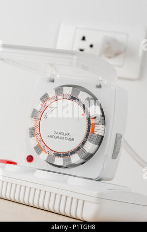 electrical socket with 24 hours program timer Stock Photo - Alamy