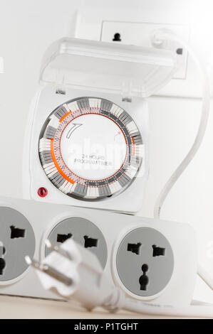 electrical socket with 24 hours program timer Stock Photo - Alamy