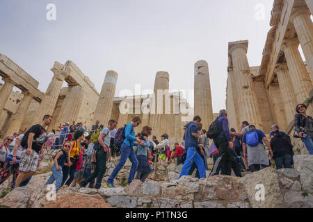 Athens, Greece - April 16, 2018: Tourists crowd the propyla (entrance ...