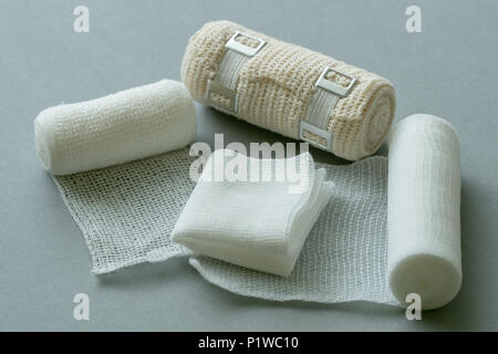 Medical bandages on gray background. Medical equipment Stock Photo - Alamy