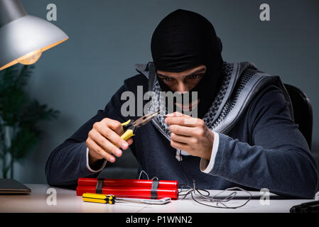 Terrorist bomber preparing dynamite bomb Stock Photo - Alamy