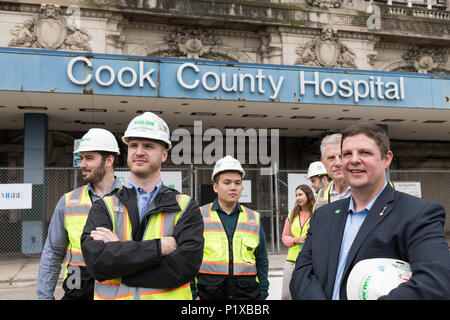 Attendees at the groundbreaking ceremony for the redevelopment of Cook ...