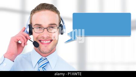 Customer service man with chat bubble Stock Photo - Alamy