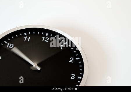 Clock hand is moving from five to eleven till ten past eleven Stock ...