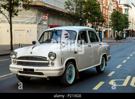 Customised Royal Enfield fleet outside Buckingham Palace for the ...