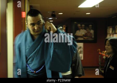 TOKYO, Japan - Popular sumo wrestler Terao has his hair knot cut by his ...
