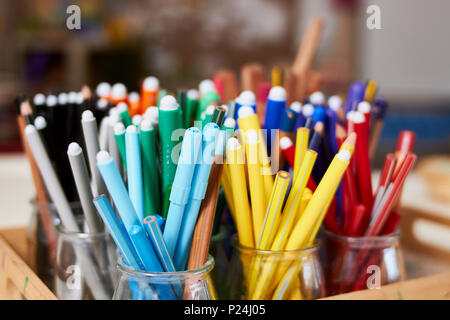 Markers set in glass cups Stock Photo - Alamy