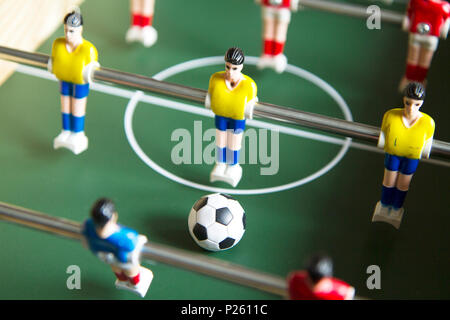 Close up image of table socker game and players Stock Photo - Alamy