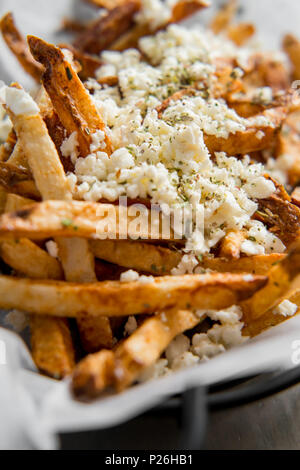 Delicious Mediterranean street cart fried potatoes with feta cheese ...