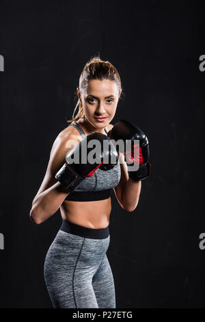 Young female boxer isolated on white Stock Photo - Alamy