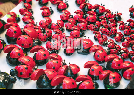 Many artificial lady bug toy Stock Photo - Alamy
