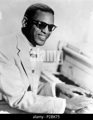 Blind American singer Ray Charles with Raifa Icarina Johnson at London ...