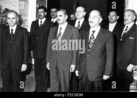 Iraqi President Saddam Hussein with Baath Party founder Michel Aflaq in ...