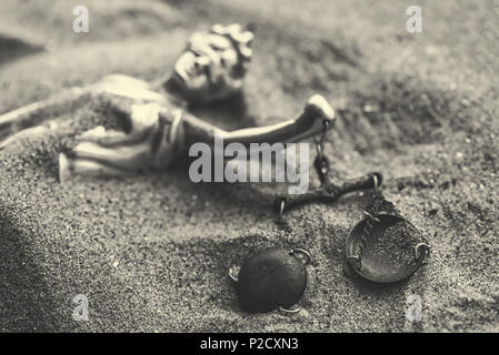 Statue of lady Justice with scale buried in sand, concept of unsolved ...