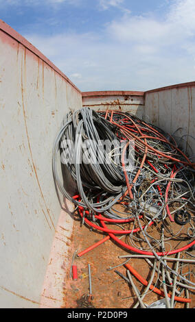 big electric cables in a container of a landfill Stock Photo - Alamy