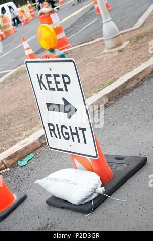Keep left , keep right, road traffic sign on raised platform to create ...