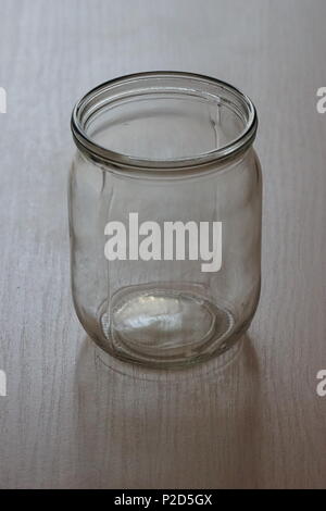 Glass jar half liter empty on a white background Stock Photo - Alamy