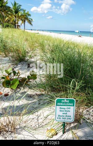 Warning Sign to keep off beach sand dunes Stock Photo - Alamy