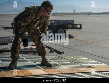 Chief Warrant Officer Daniel Wood (left), the executive officer for the ...