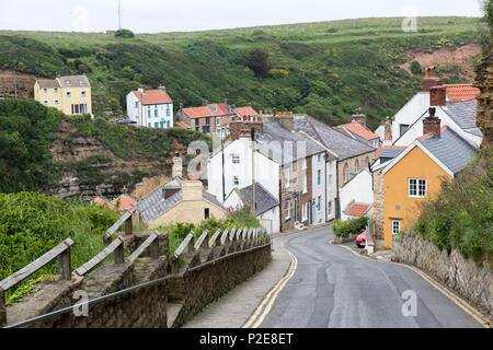 The steep road down into the village of Staithes, North Yorkshire ...