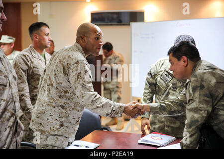 U.S. Marine Maj. David Rainey, right, the commanding officer of Task ...