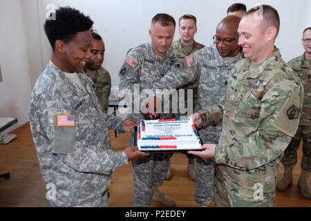 WACKERNHEIM, Germany — Col. John E. Dethlefs, right, takes the guideon ...