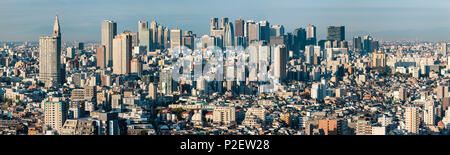 Tokyo Tower behind a high-rise apartment building in Tokyo, Japan Stock ...