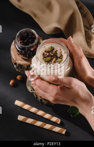 Crop person holding appetizing sweet Belgian waffles with chocolate ...