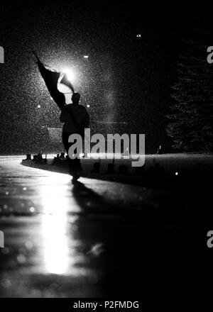 An Airman carries the Prisoner of War/Missing in Action flag during the ...