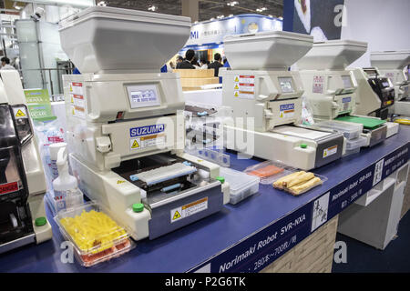 Tokyo Japan. 15th June 2018. Sushi making machines produced by Suzumo Machinery Co. Ltd. on display during the International Food Machinery and Technology Exhibition FOOMA JAPAN in Tokyo Big Sight Tok...