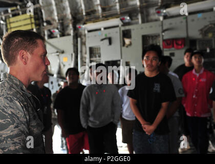 Col. Robert Copes, 15th Maintenance Group commander, presents the ...