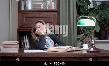 Attractive female librarian at work Stock Photo - Alamy