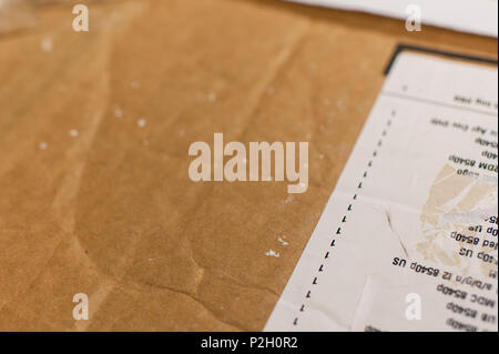 White powder residue is visible on a simulated suspicious package ...