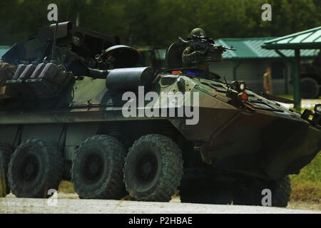 A Light Armored Vehicle Anti-Tank prototype is given a swim test at the ...