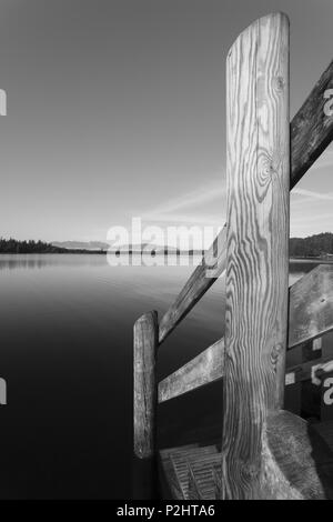 wooden pier, bathing pier at lake Kirchsee near Sachsenkamm in Spring ...