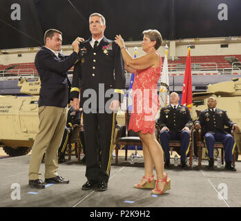 Family members pin brigadier general rank on to Brig. Gen. Melissa ...