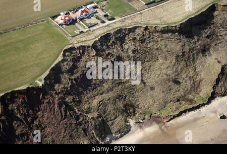 Sea cliffs of boulder clay in front of beaches. Clay Cliffs and Beach ...