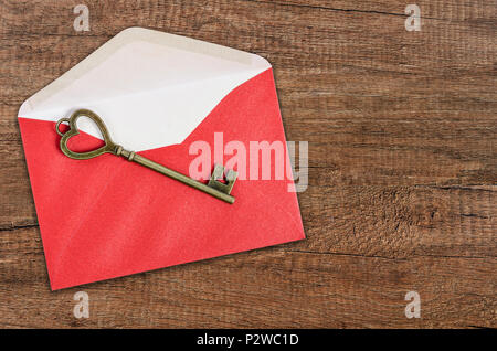 Vintage key on red envelope isolated on white background, Save clipping ...
