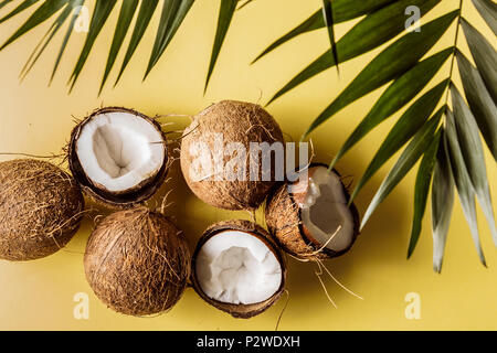 Creative top view flat lay white wooden hangers best offer pastel pink ...