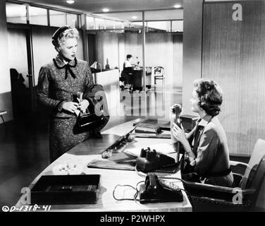 THE SOLID GOLD CADILLAC, director Richard Quine (right) with wife ...