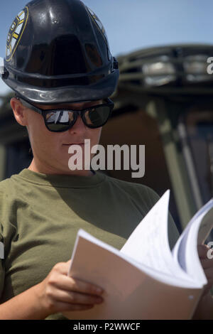A U.S. Marine Corps D6K Bulldozer with Marine Wing Support Squadron ...